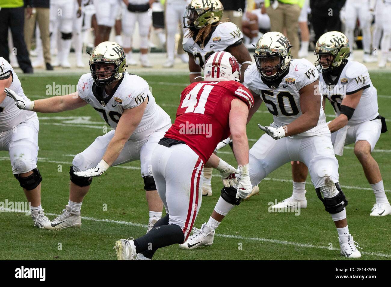 Charlotte, NC, USA. 30th Dec, 2020. Wake Forest OL Sean Maginn (79) and ...