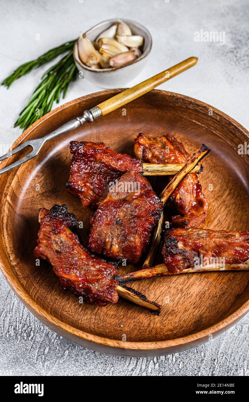 BBQ grilled sliced lamb short spare loin ribs. White background. Top ...