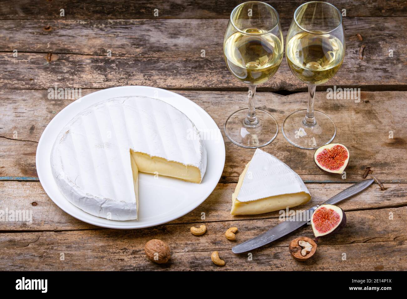 Soft french cheese with white mold Brie with wine Stock Photo - Alamy