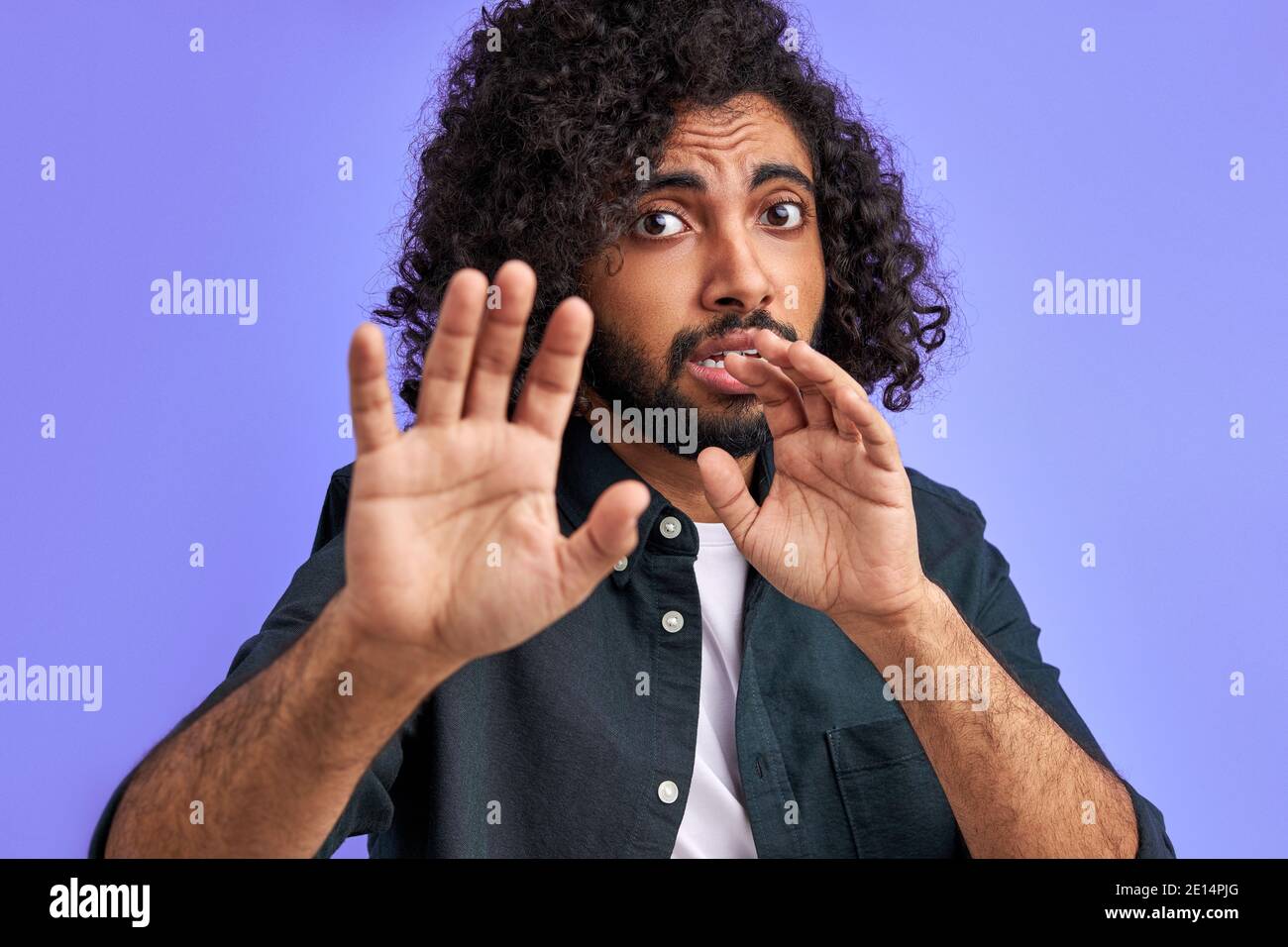 male is panicking. young arab man is terrified with fear expression ...