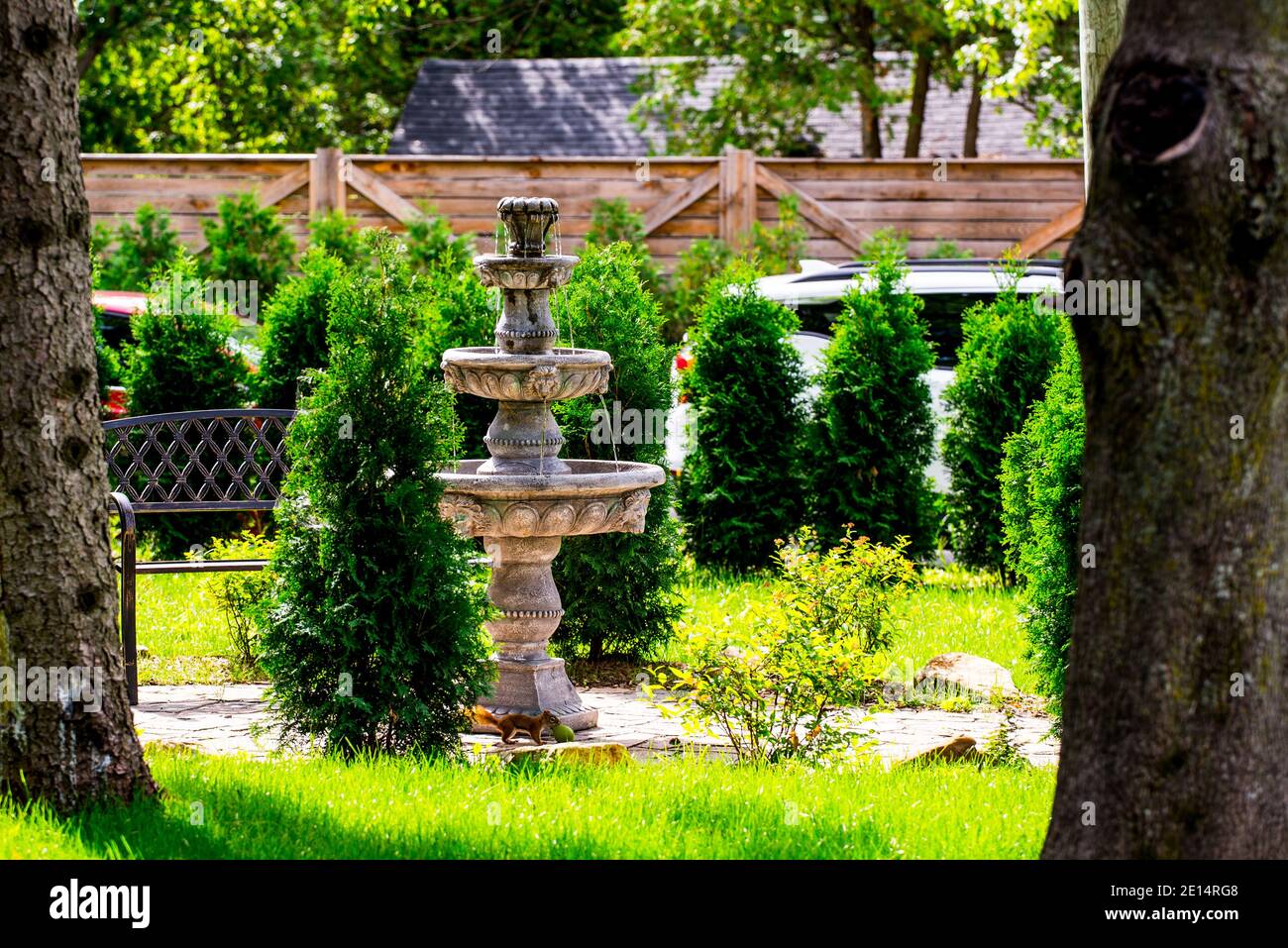 Quebec, Canada - August 25 2020: Backyard with trees and fountains ...