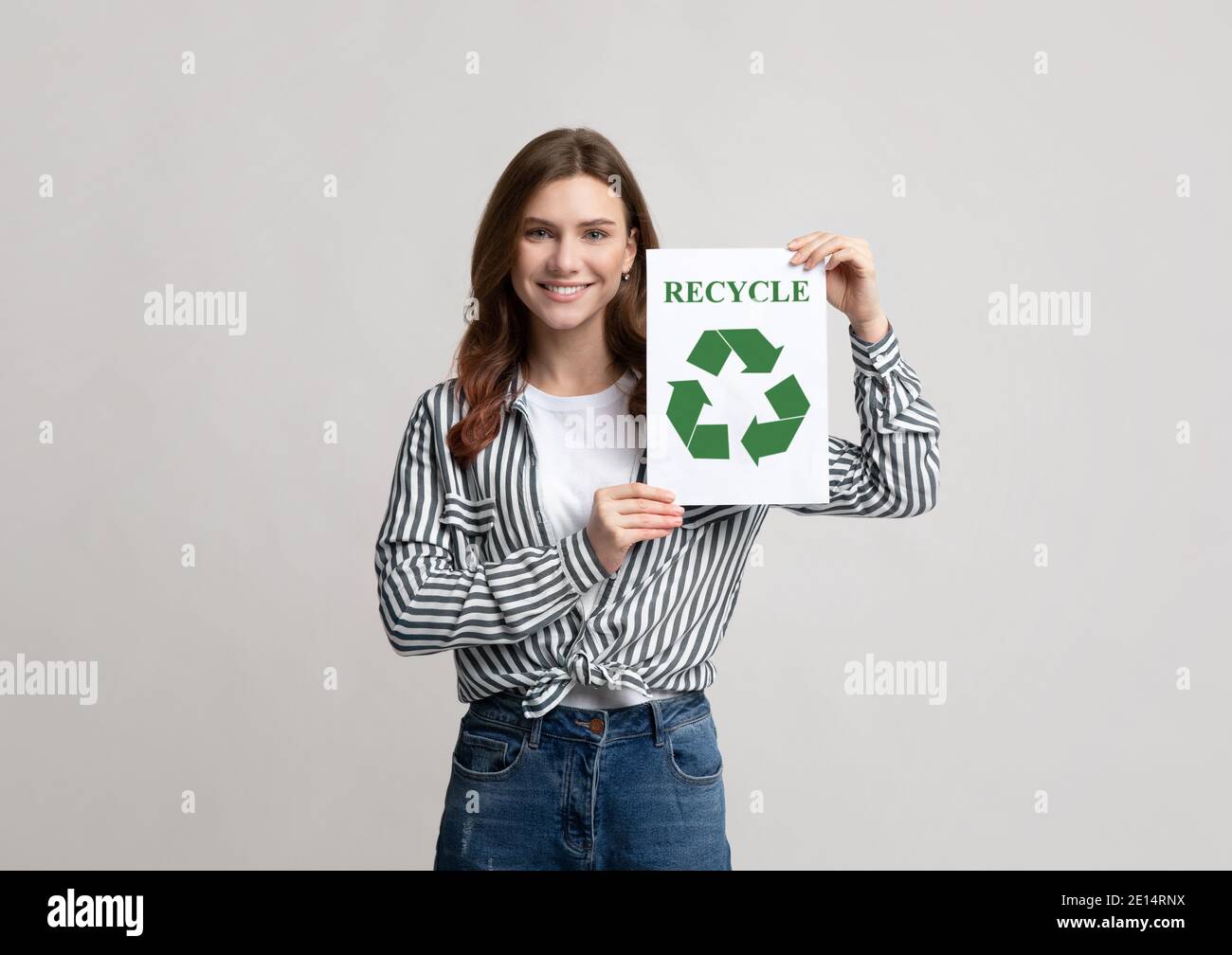 Recycle Concept. Young Smiling Woman Holding Placard With Green ...