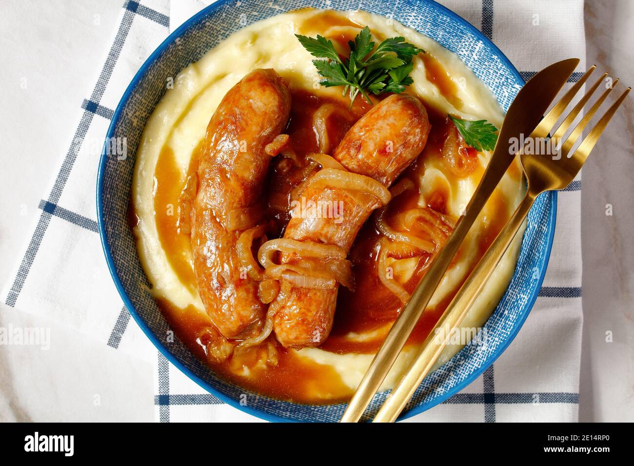 British food bangers and mash or pork sausage with onion gravy and ...