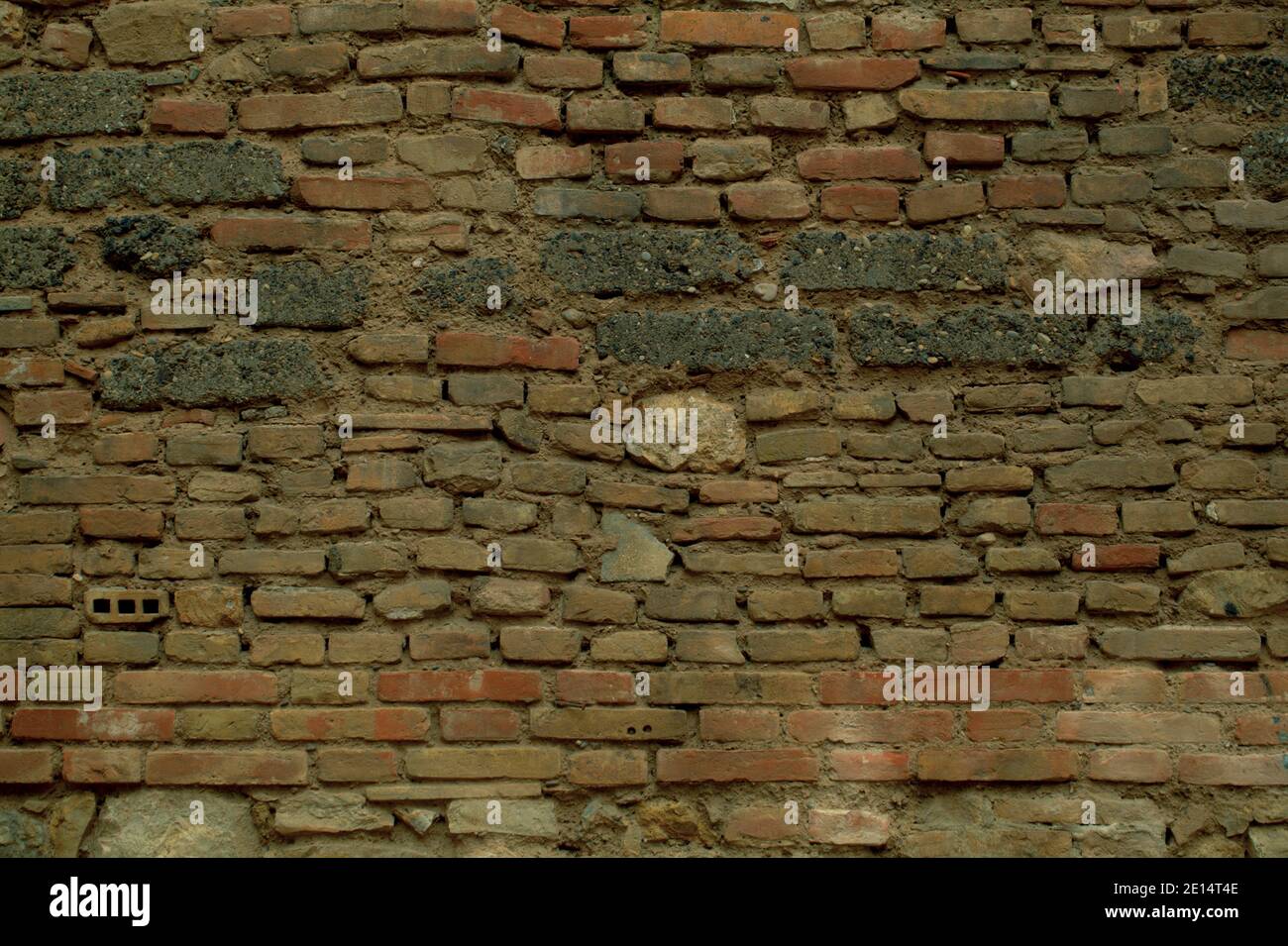Old weathered irregular brick wall texture Stock Photo - Alamy