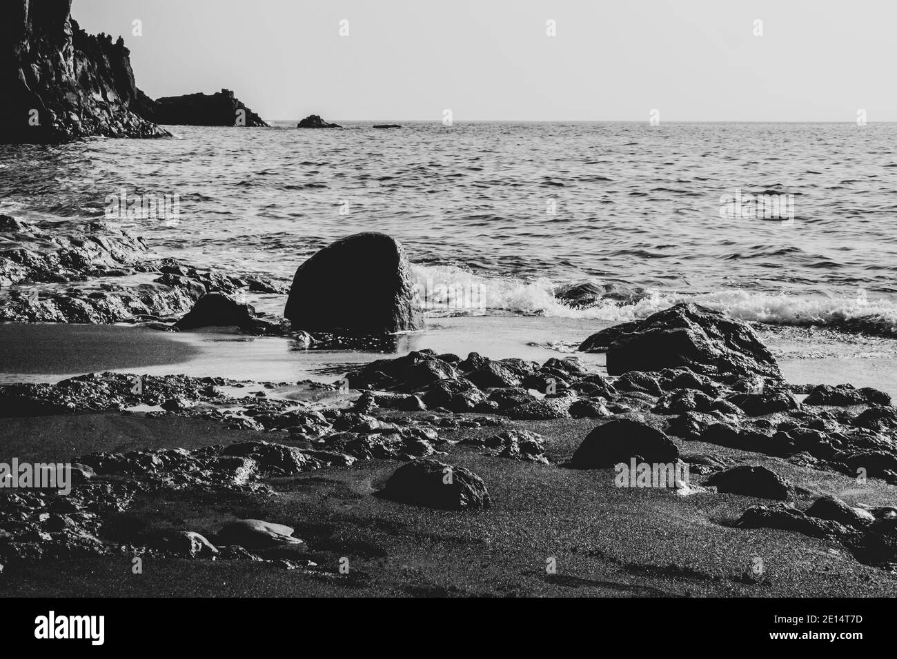 Coast With Rocks And Beach At The Sea Stock Photo - Alamy