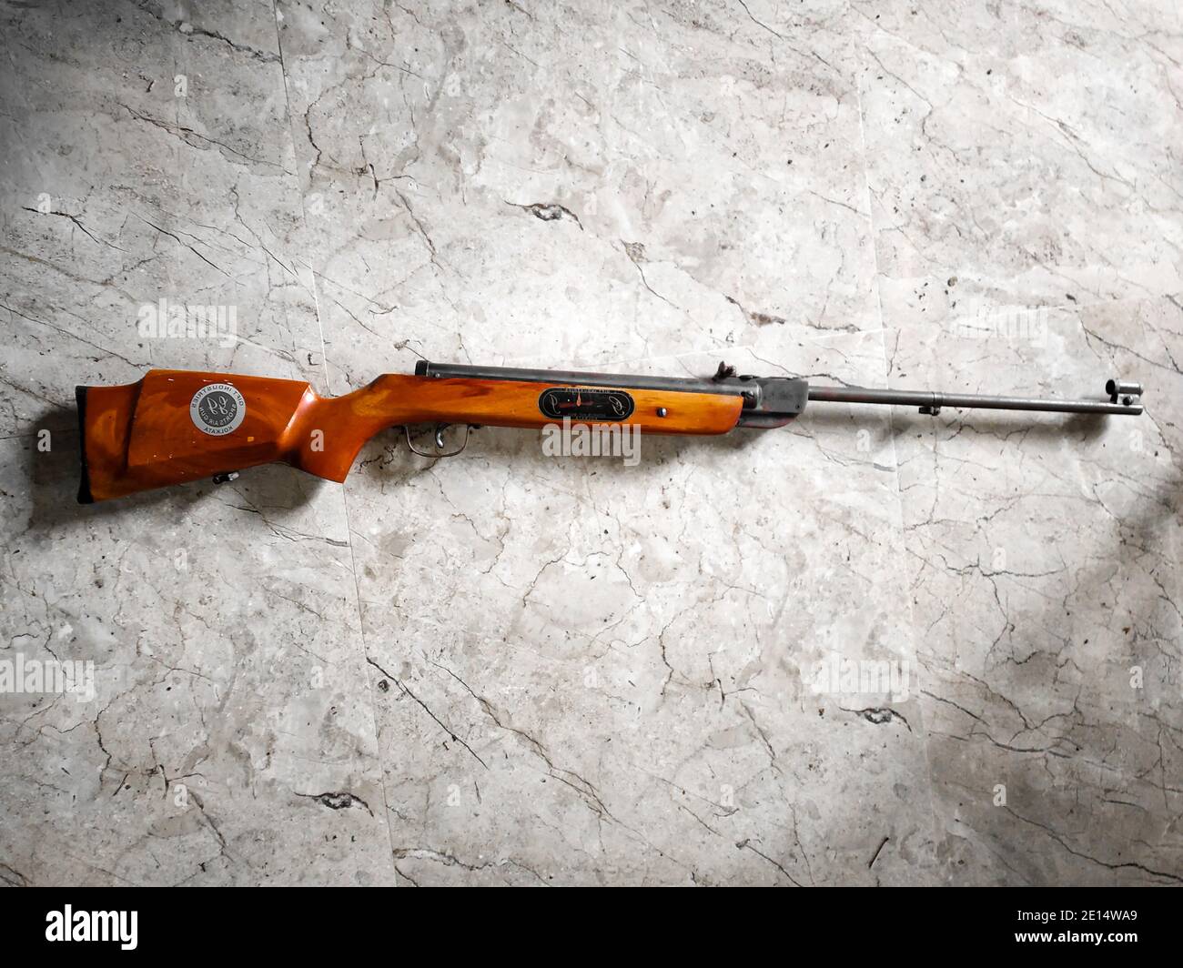 Classic vertical double-barreled hunting rifle isolate on a white ...