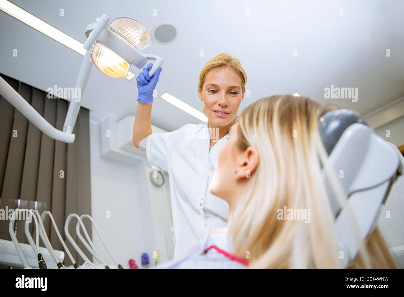 Dentist checking patients teeth hi-res stock photography and images - Alamy