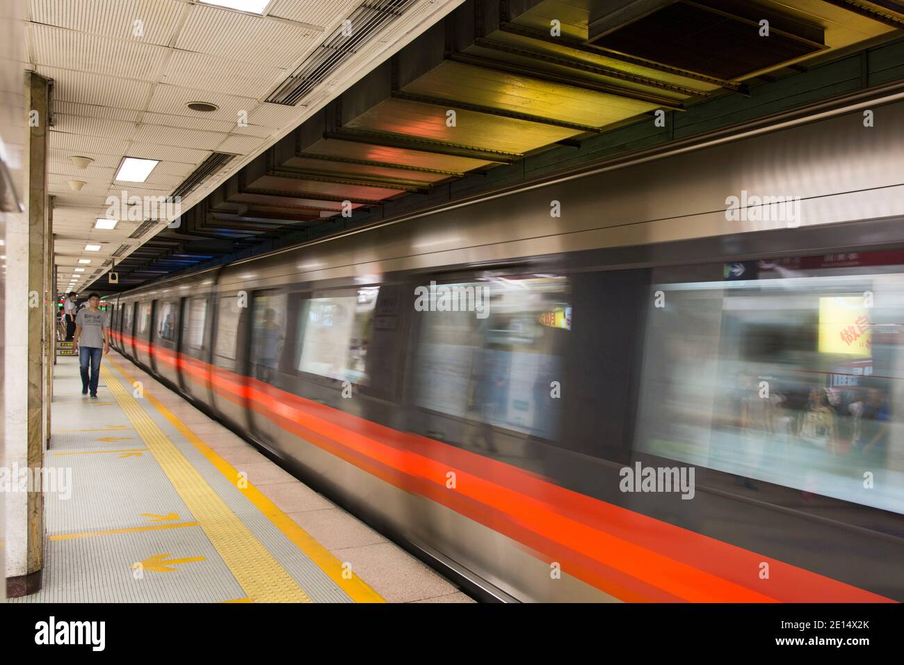 View of a modern subway train at a platform of the metro in the Chinese ...