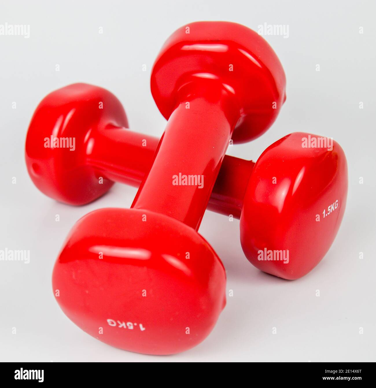 Exercise hand weights isolated on a white background Stock Photo - Alamy