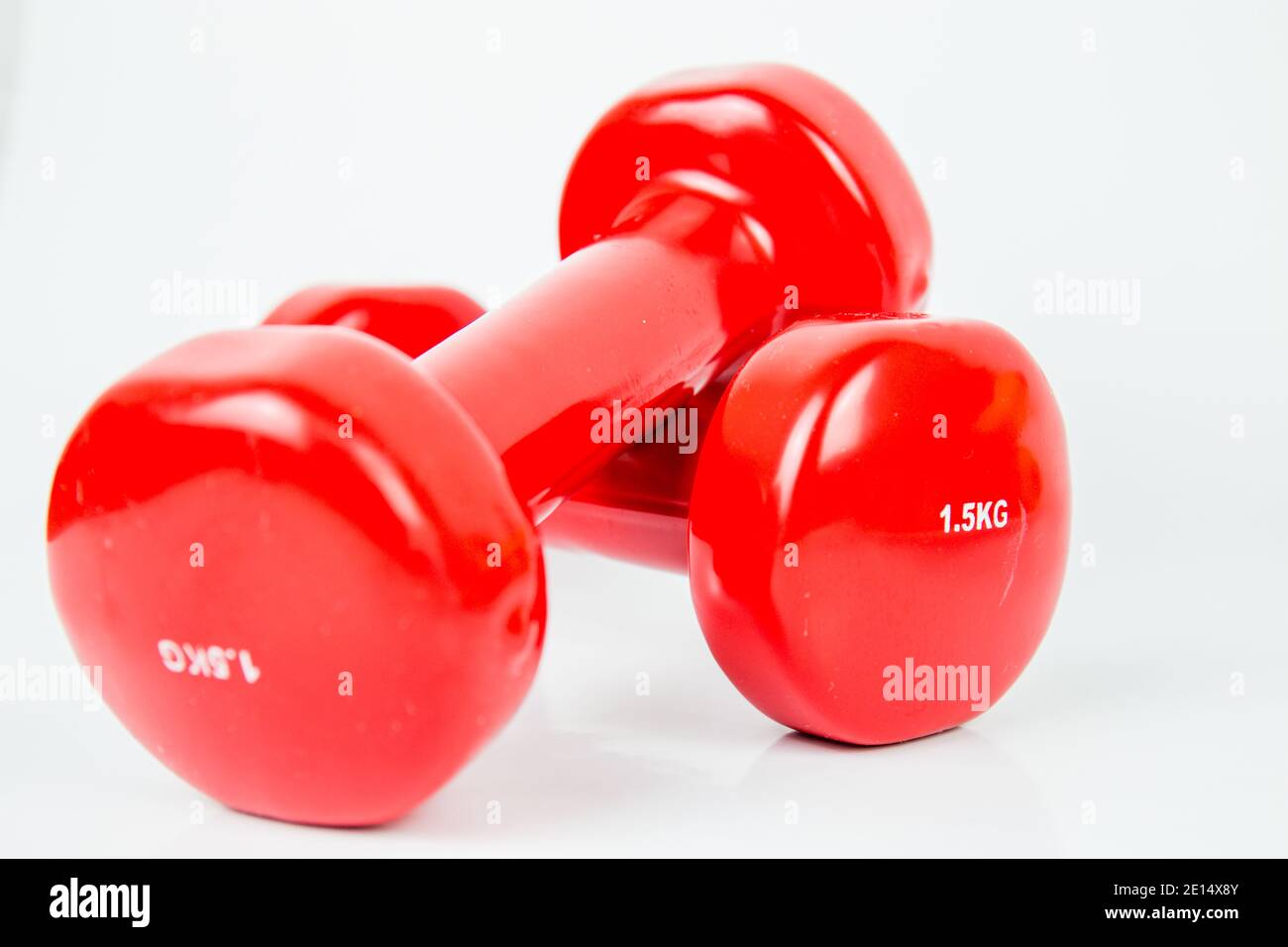 Exercise hand weights isolated on a white background Stock Photo - Alamy