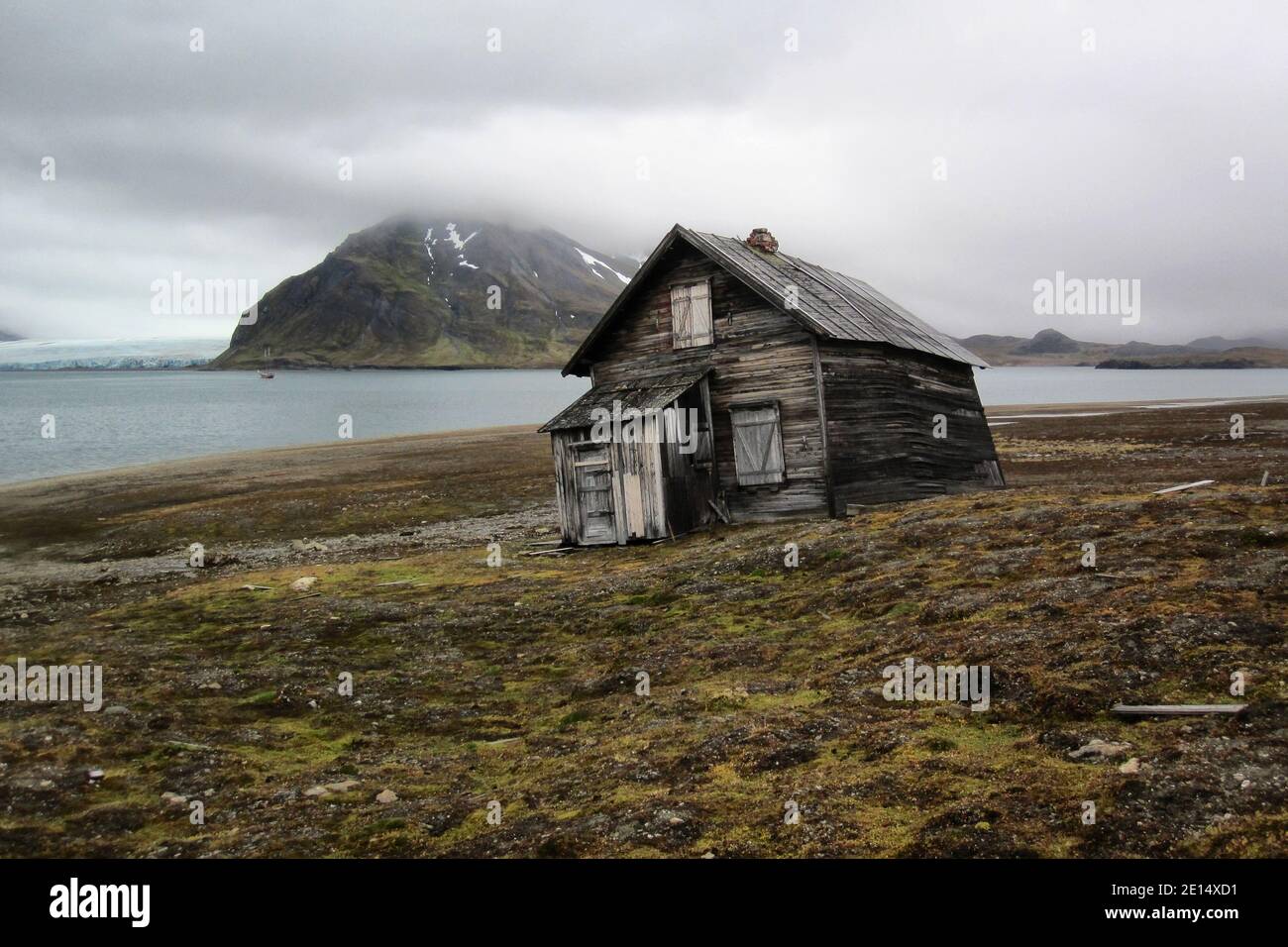 Old Crooked Wooden Hut At Svalbard Coast Stock Photo - Alamy