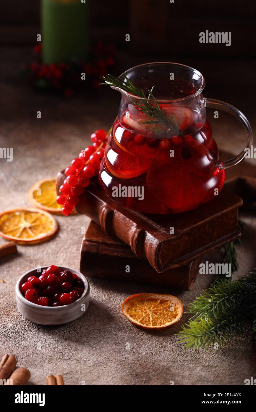 red berry tea with cinnamon and orange Stock Photo - Alamy