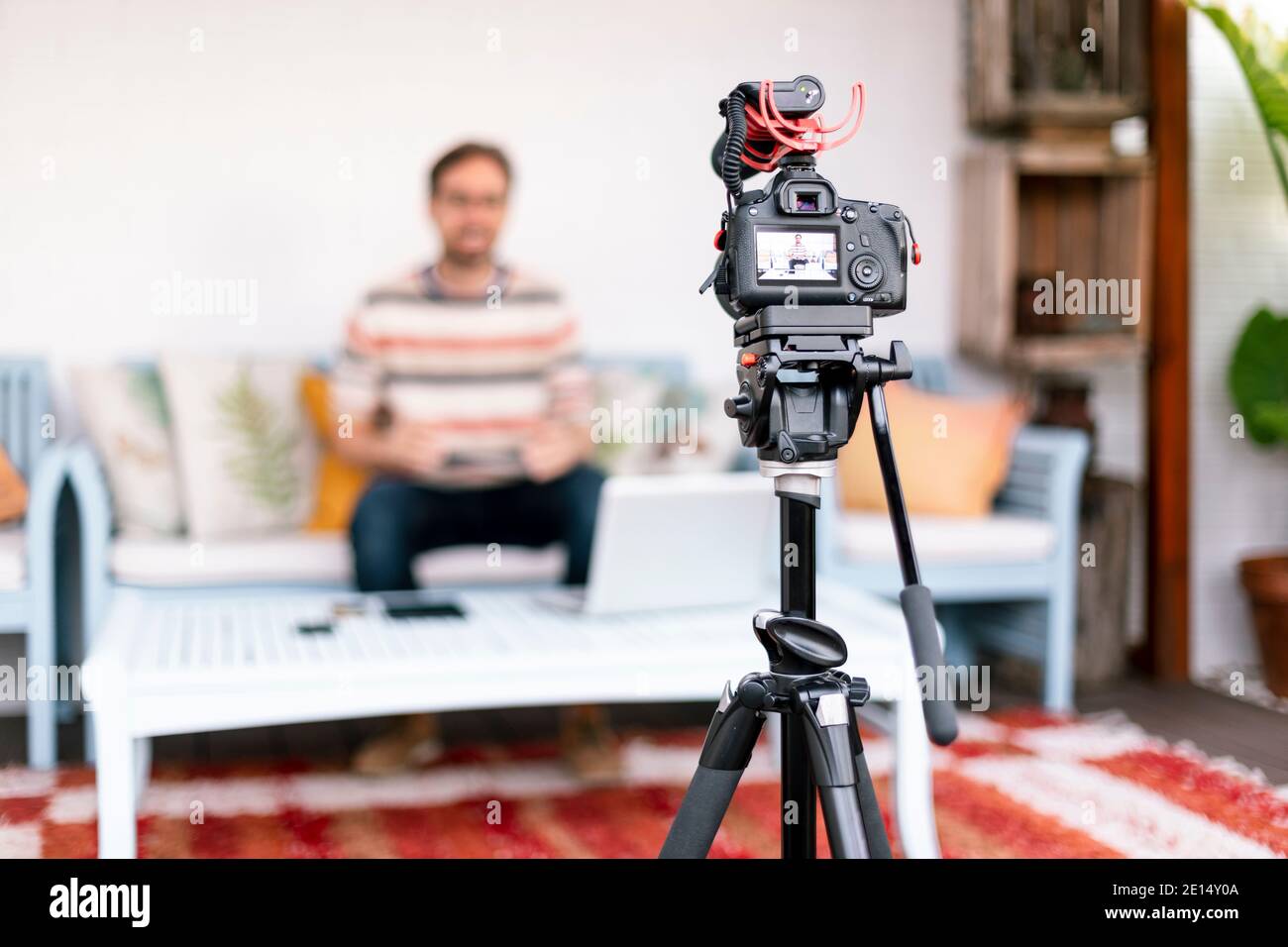 Man recording content for his vlog. Focus on camera screen. Camera ...