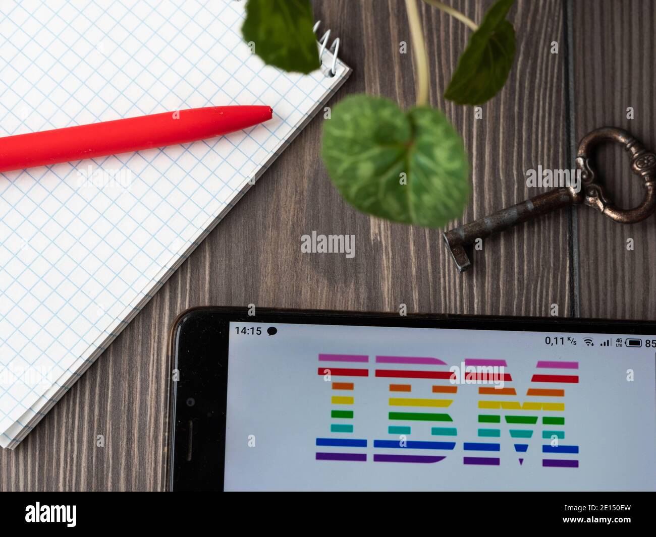 In this photo illustration an IBM logo seen displayed on a smartphone ...