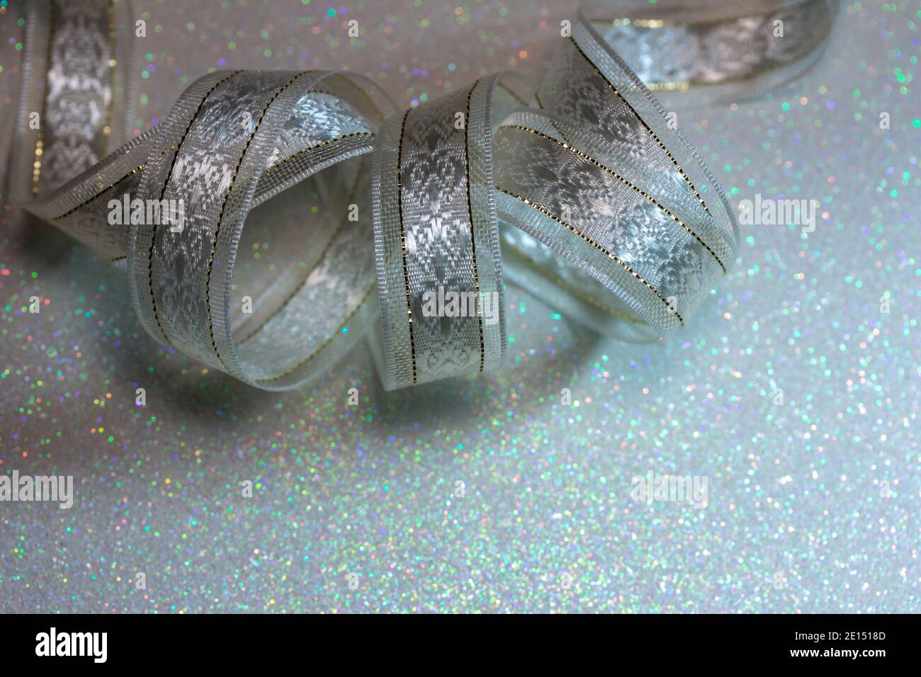 Macro full frame texture abstract of shimmering silvery white brocade ...