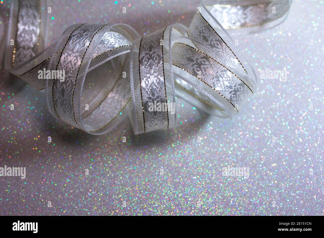 Macro full frame texture abstract of shimmering silvery white brocade ...