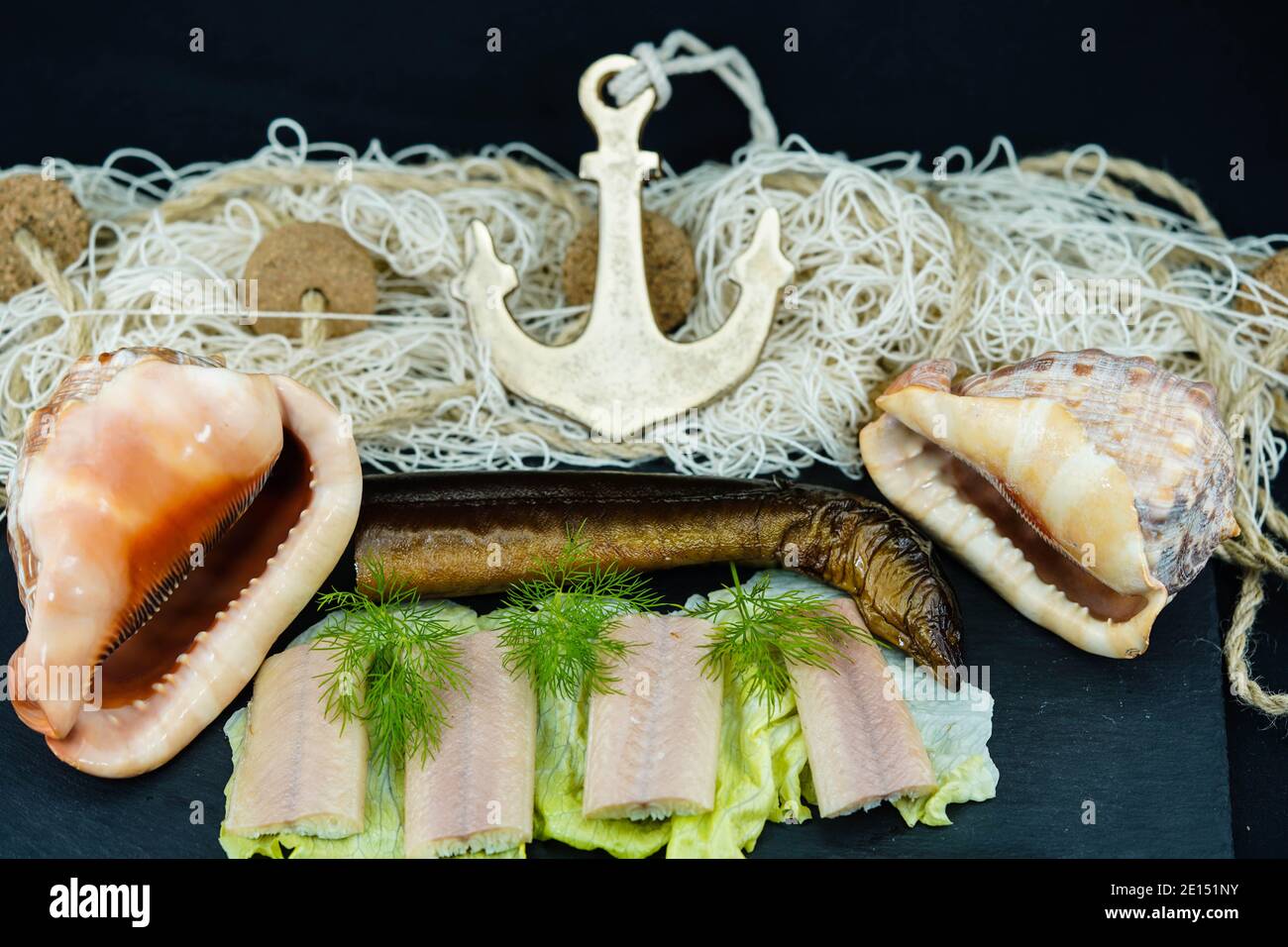 Fillet of a golden smoked eel Stock Photo - Alamy