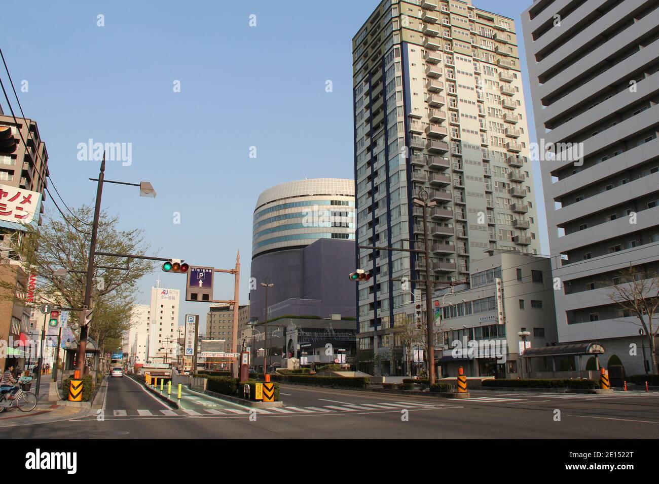 street and modern buildings in okayama in japan Stock Photo - Alamy