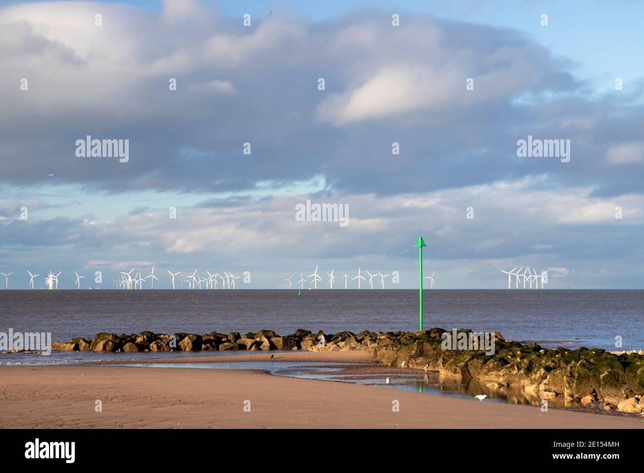 Breakwater and offshore turbines, Prestatyn Beach, North Wales Stock ...