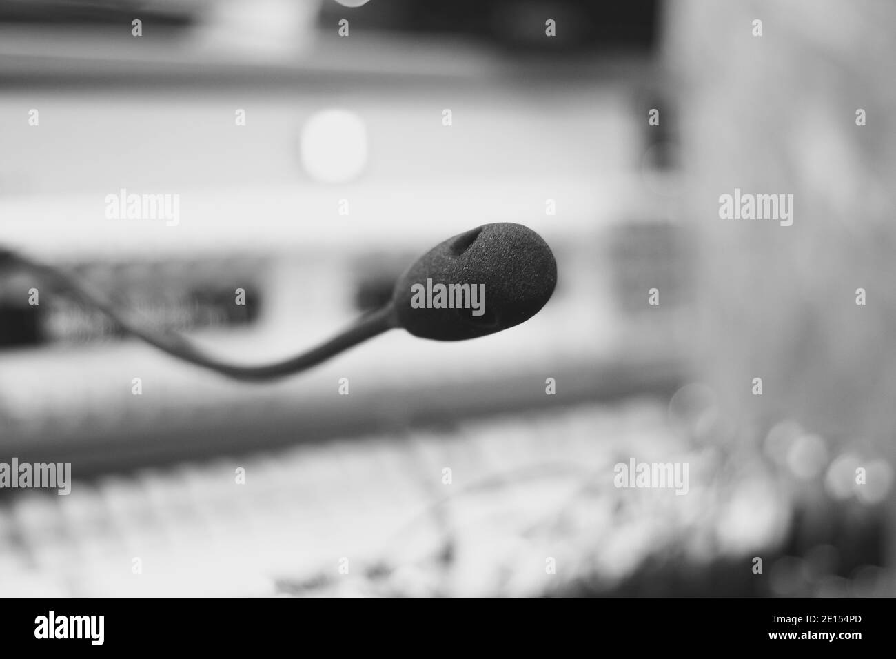 microphone at a press conference close-up, background in out of focus ...