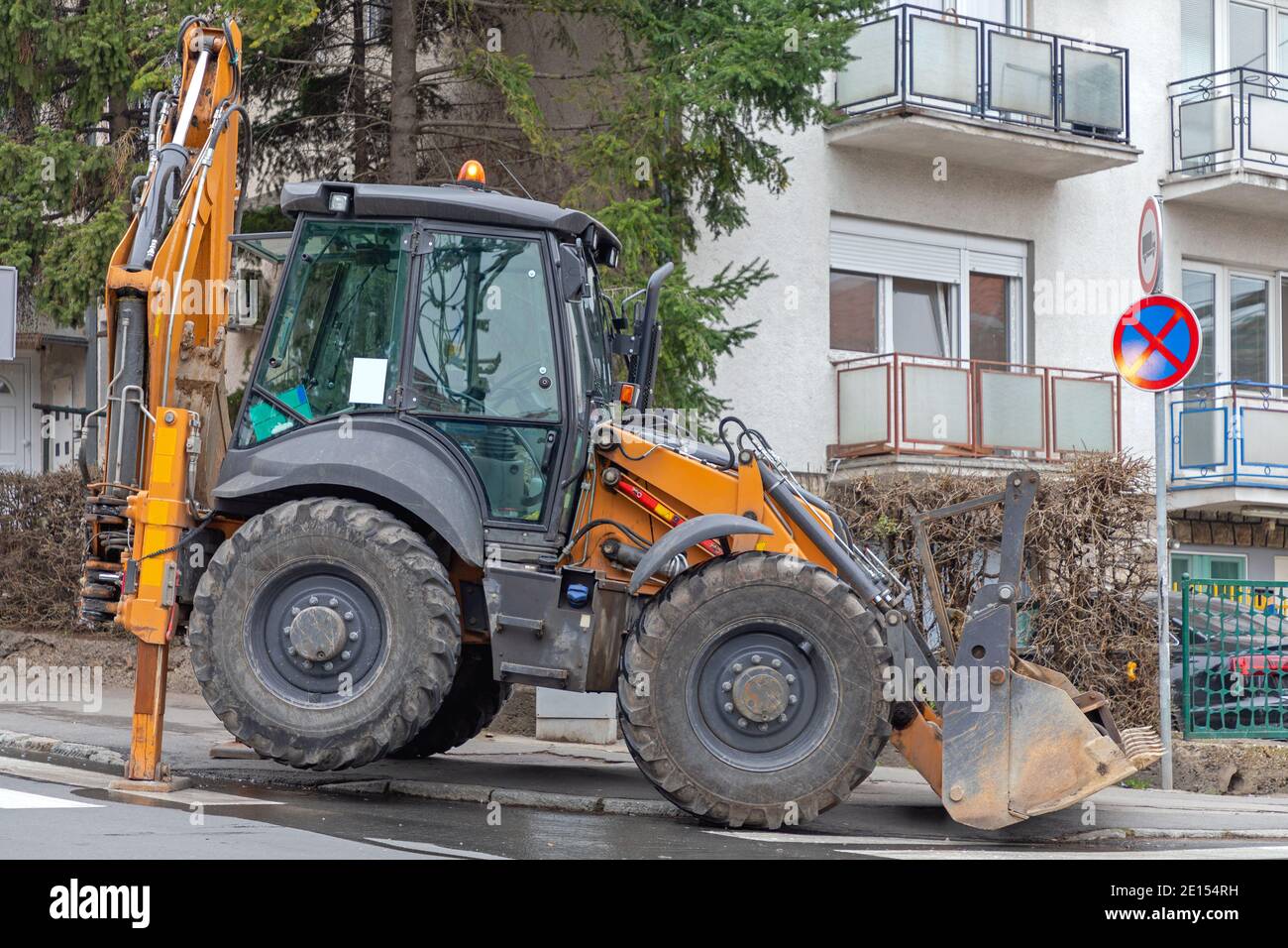 Backhoe Digger Loader Construction Machine at Street Stock Photo - Alamy