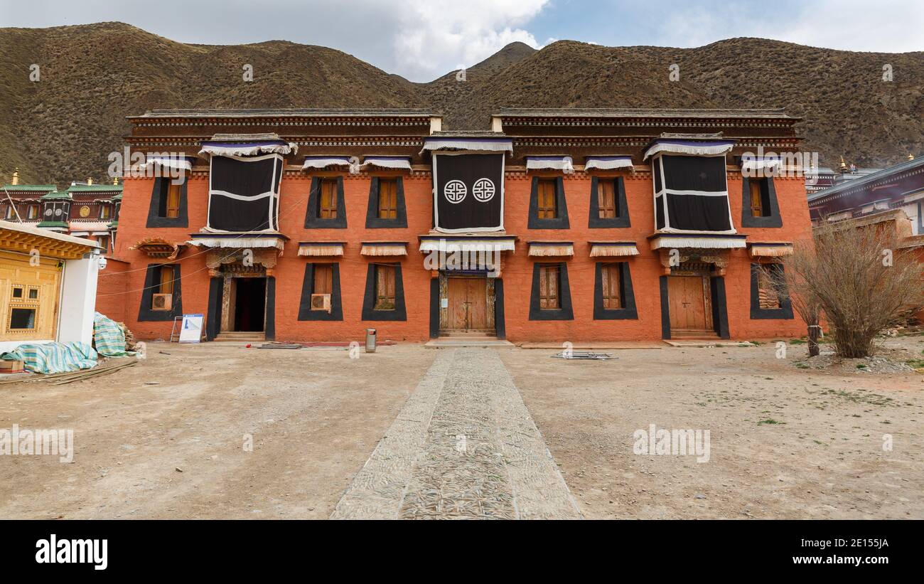 Xiahe, Gansu Province, China - April 28, 2017: Orange colored house at ...