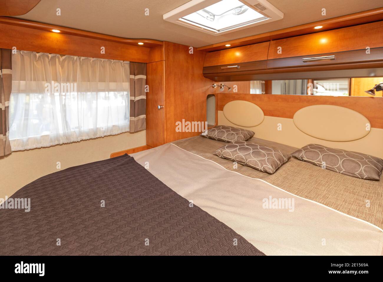 Big Bed in Mobile Home Camper Bedroom Stock Photo - Alamy
