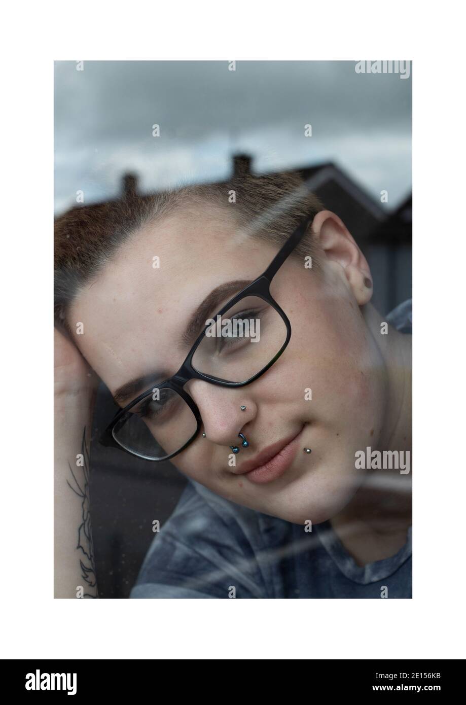 Portrait girl window Cut Out Stock Images & Pictures - Alamy