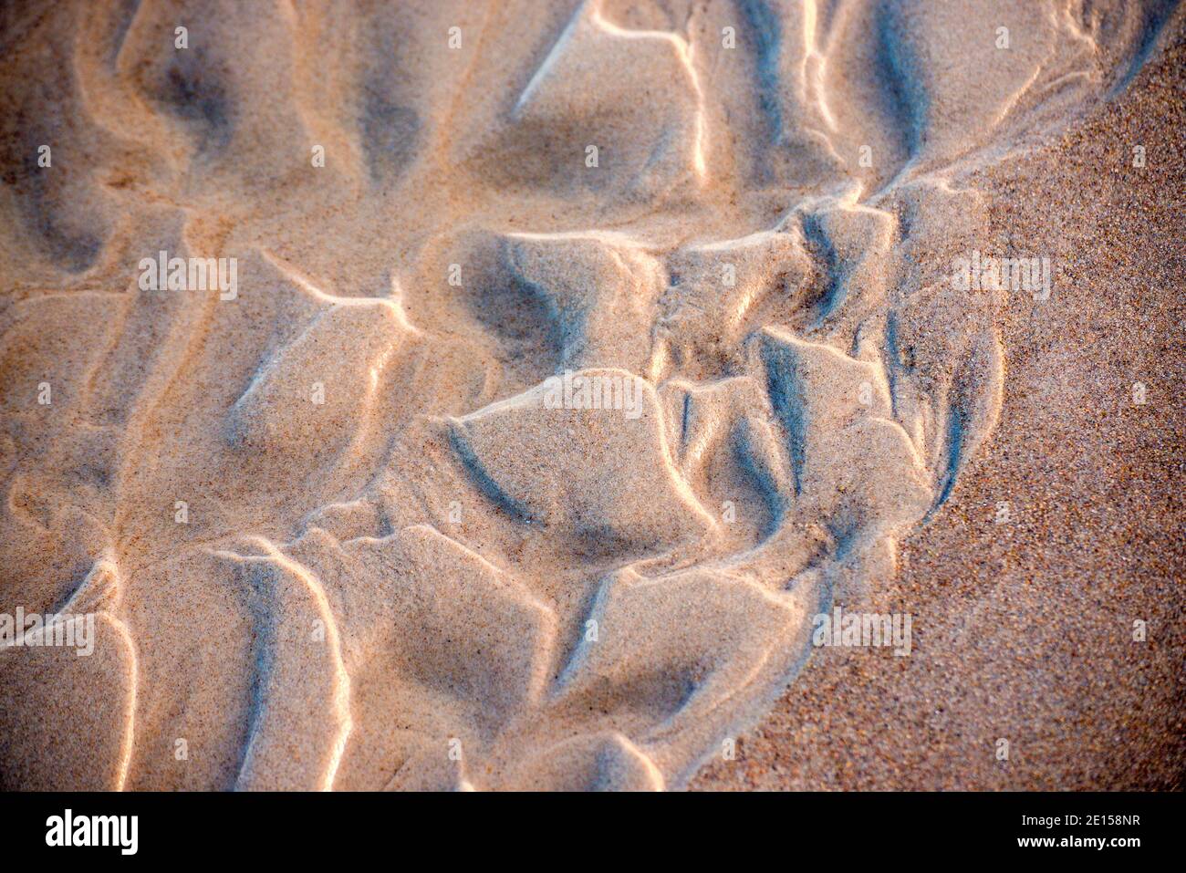 Sand Of A Beach With Patterns Stock Photo - Alamy