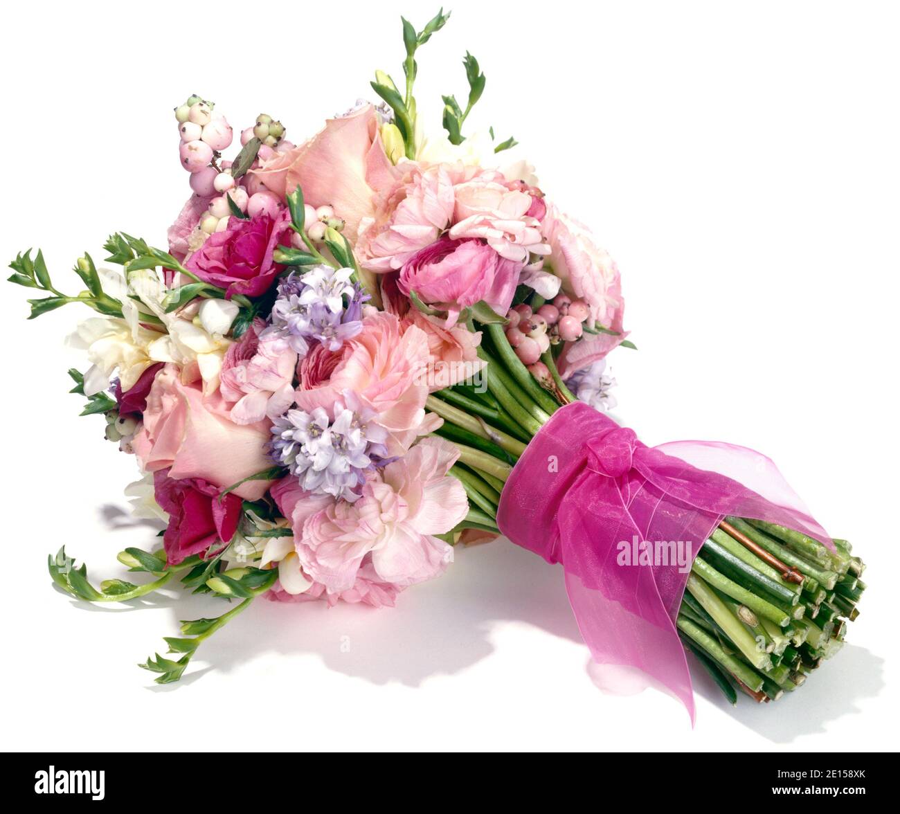 Side view of a fresh pink and purple flower bouquet photographed on a ...