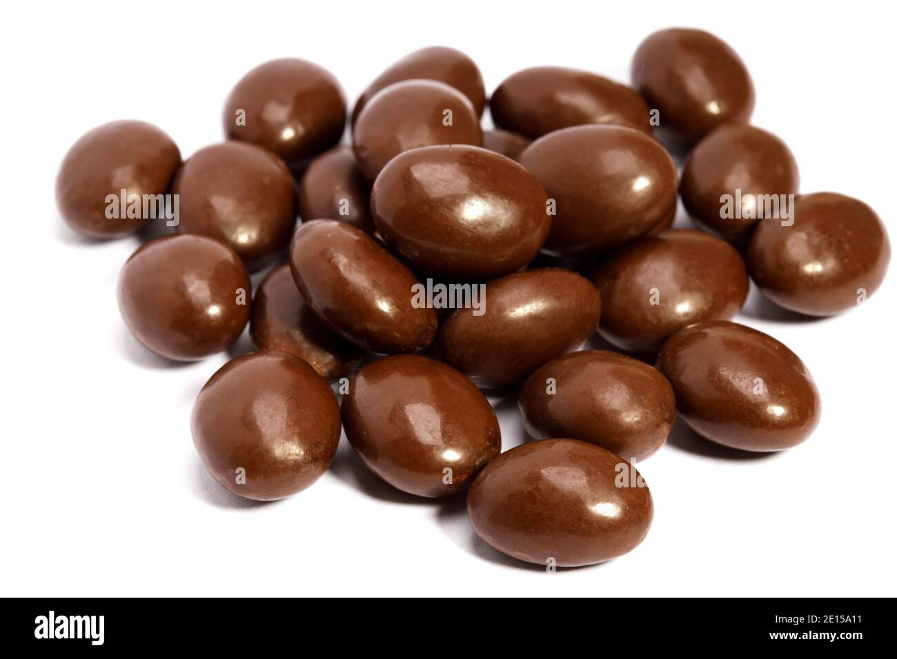 chocolate pills in heap isolated on white Stock Photo - Alamy
