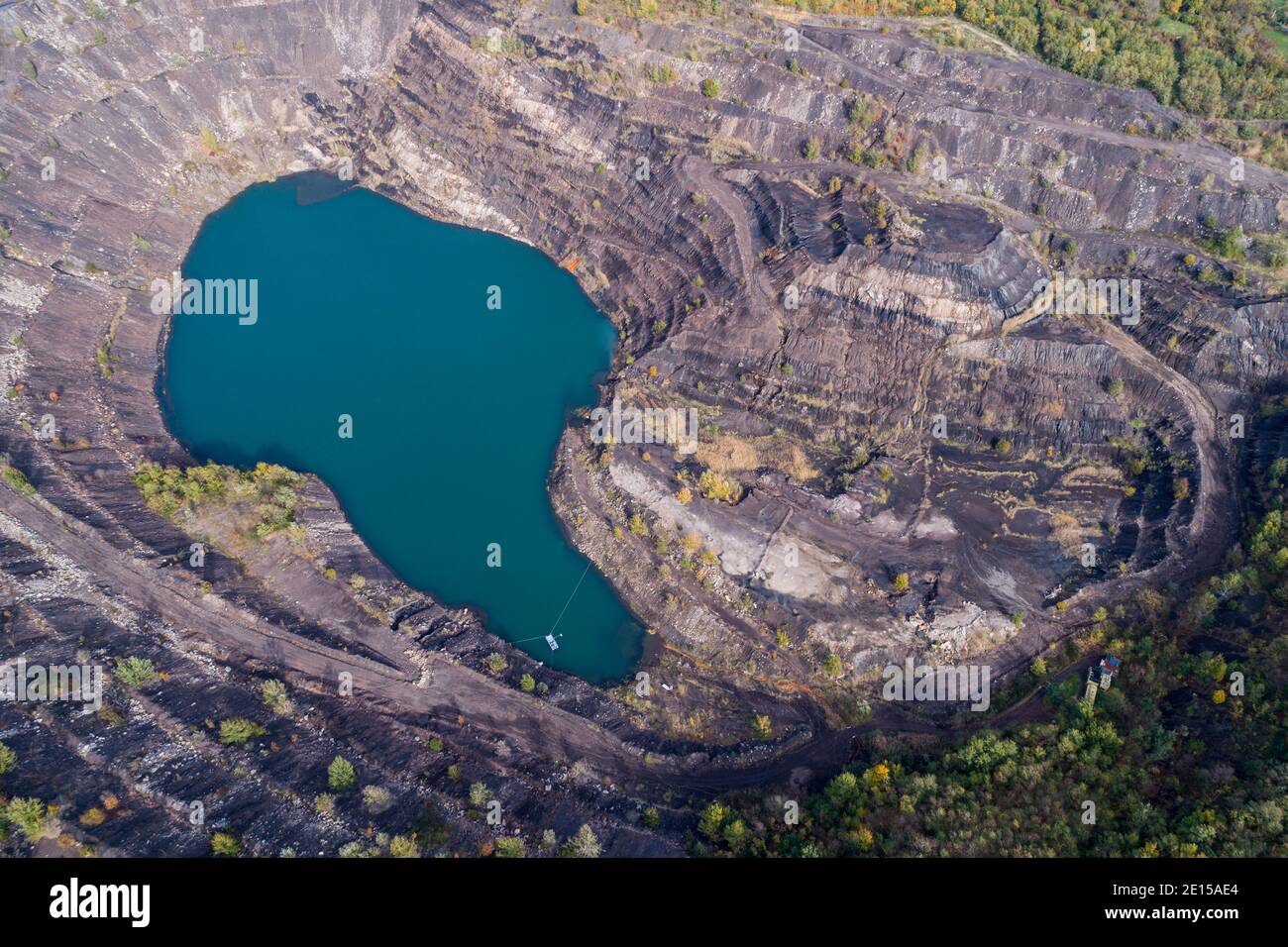 Aerial view, deep mine lake in place of a mining pit Stock Photo - Alamy