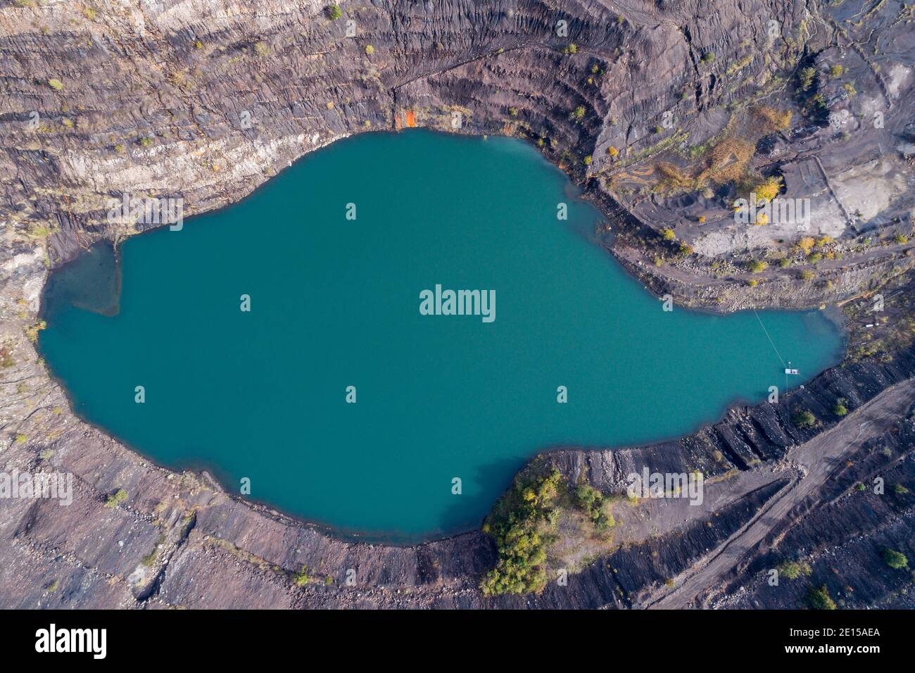 Aerial view, deep mine lake in place of a mining pit Stock Photo - Alamy