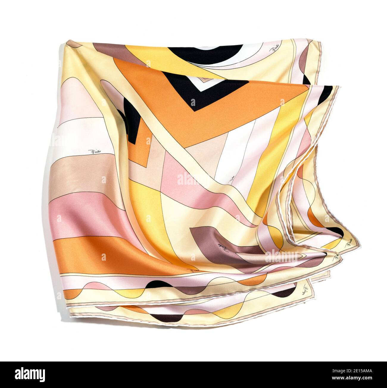 Colorful silk geometric patterned scarf photographed on a white ...