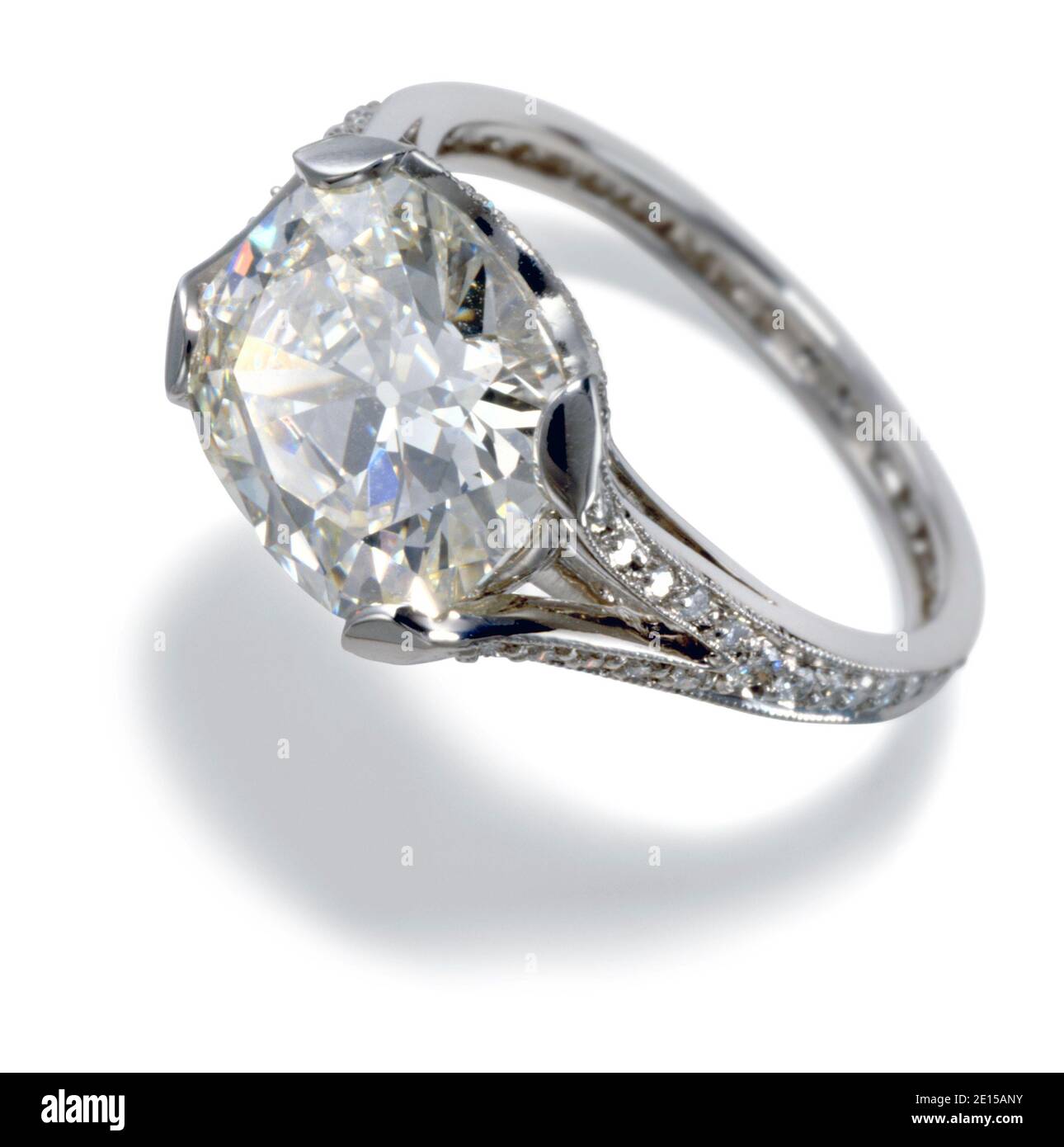 Silver Diamond ring photographed at an angle on a white background ...