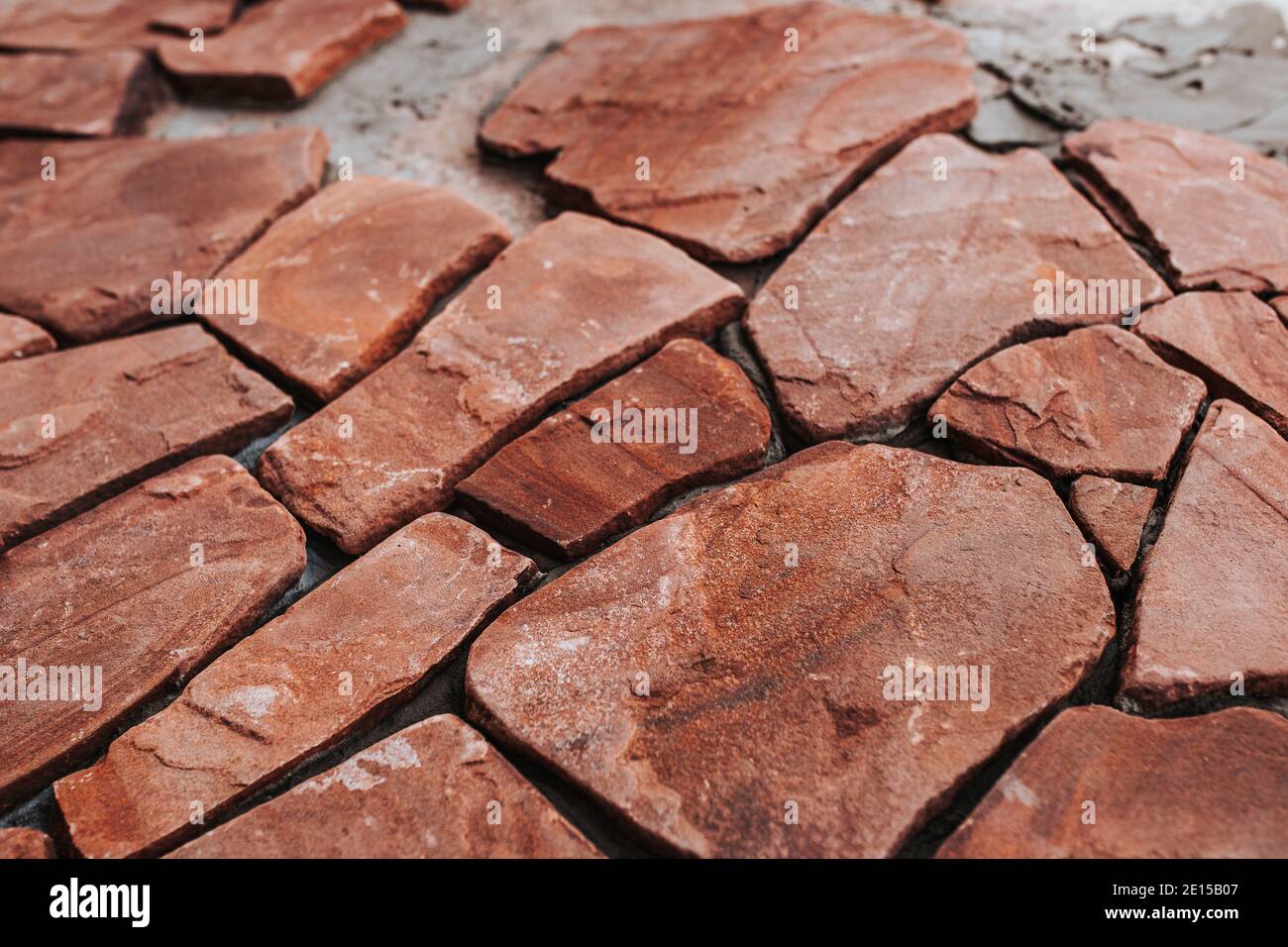 Professional laying of road stone and paving slabs for walking and ...