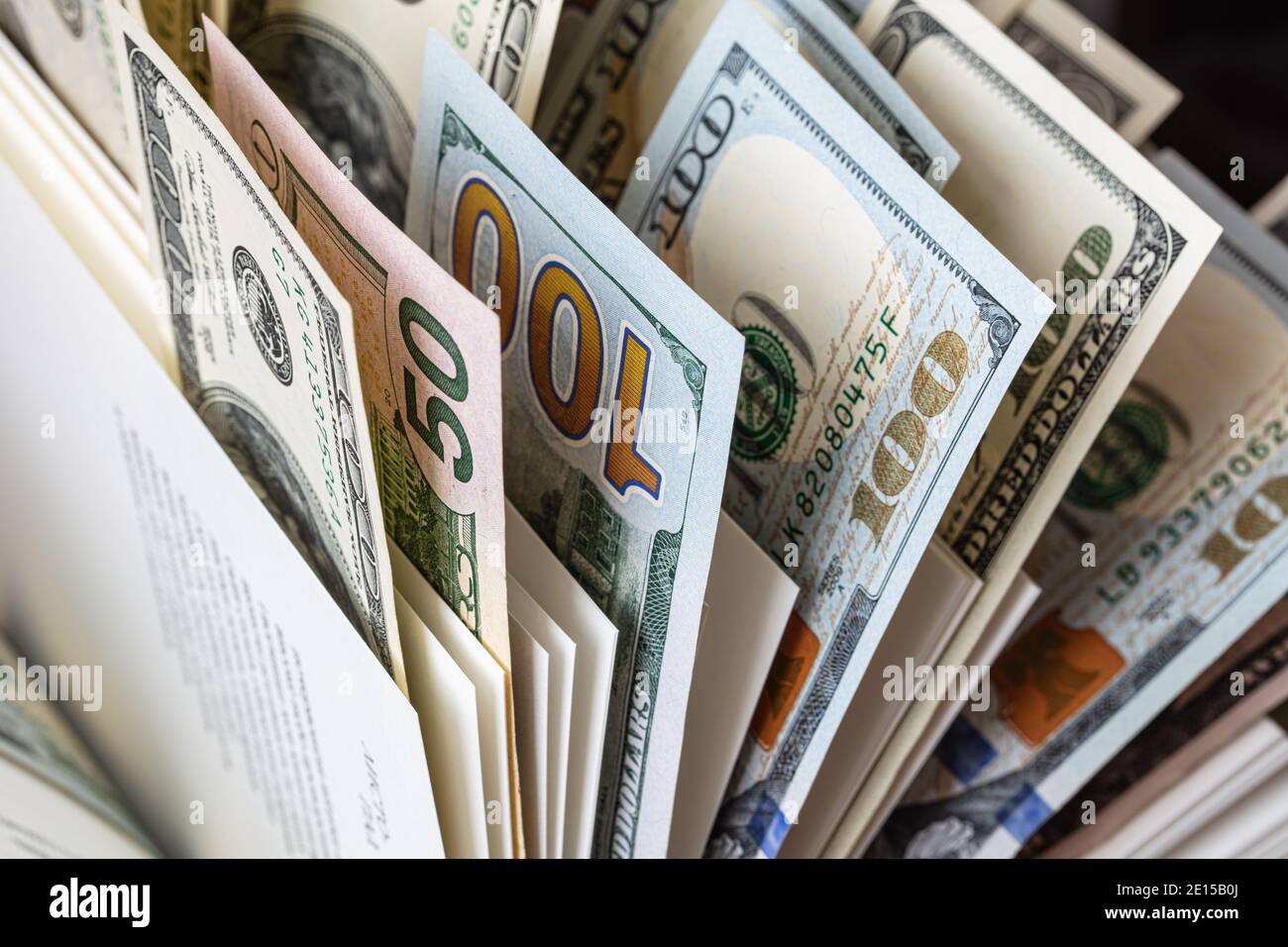 dollar banknotes in open book Stock Photo - Alamy