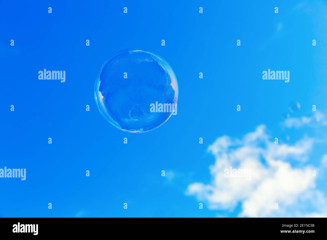picture of a soap bubble flying in front of the sky Stock Photo - Alamy