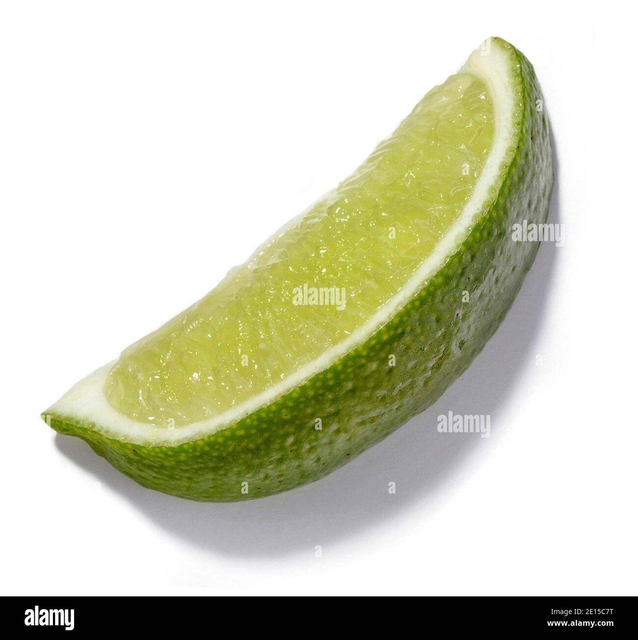 Lime slice photographed on a white background Stock Photo - Alamy
