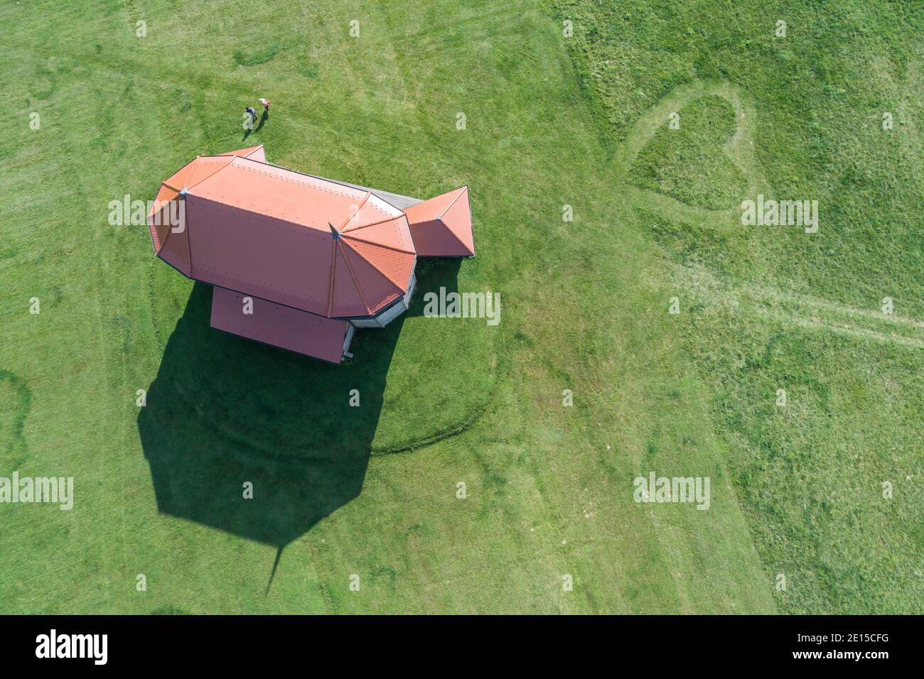 Wooden church with heart shape in grass Stock Photo - Alamy