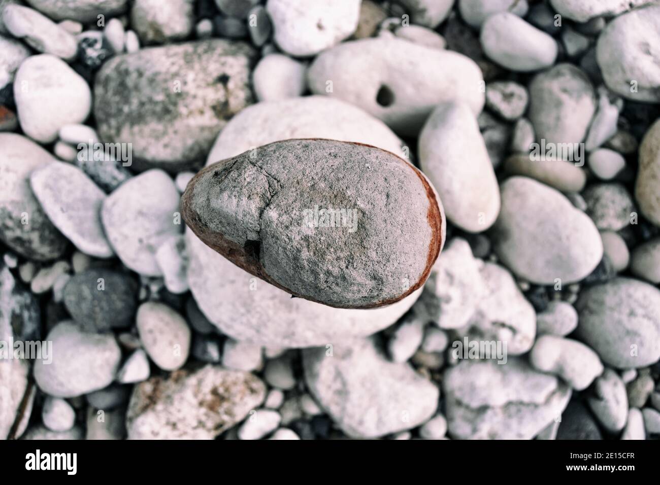 Smooth, dry river pebbles in the stream bed Stock Photo - Alamy