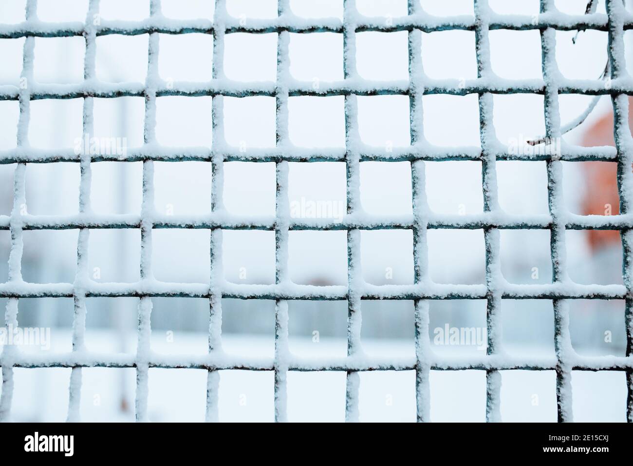 Ice-covered metal grill in winter - moisture condensation in the cold ...