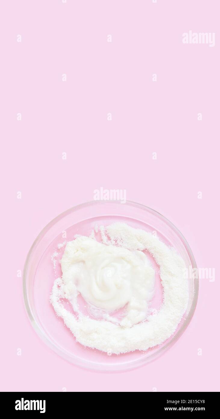 Collagen white powder. Pastel color background. Health product Stock ...