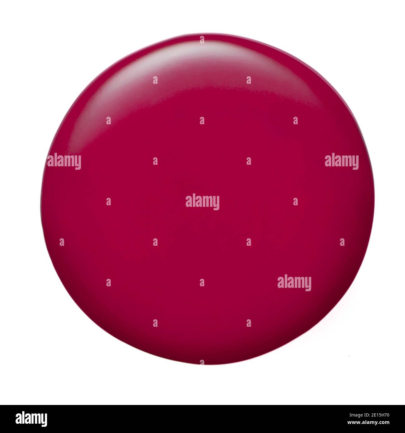 A red sample color paint puddle photographed on a white background ...