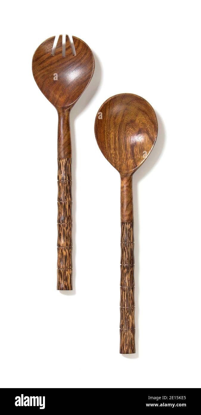Wooden serving spoon and fork photographed on a white background Stock ...