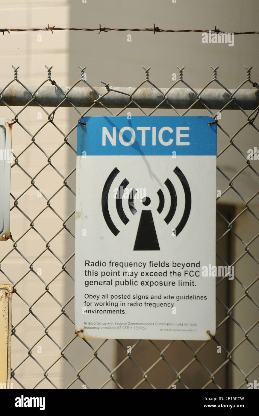 Radio frequence warning signs attached to the Radio Tower on top of the ...