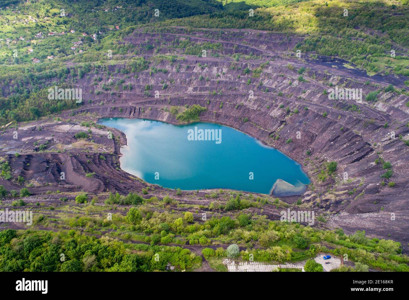 Aerial view, deep mine lake in place of a mining pit Stock Photo - Alamy