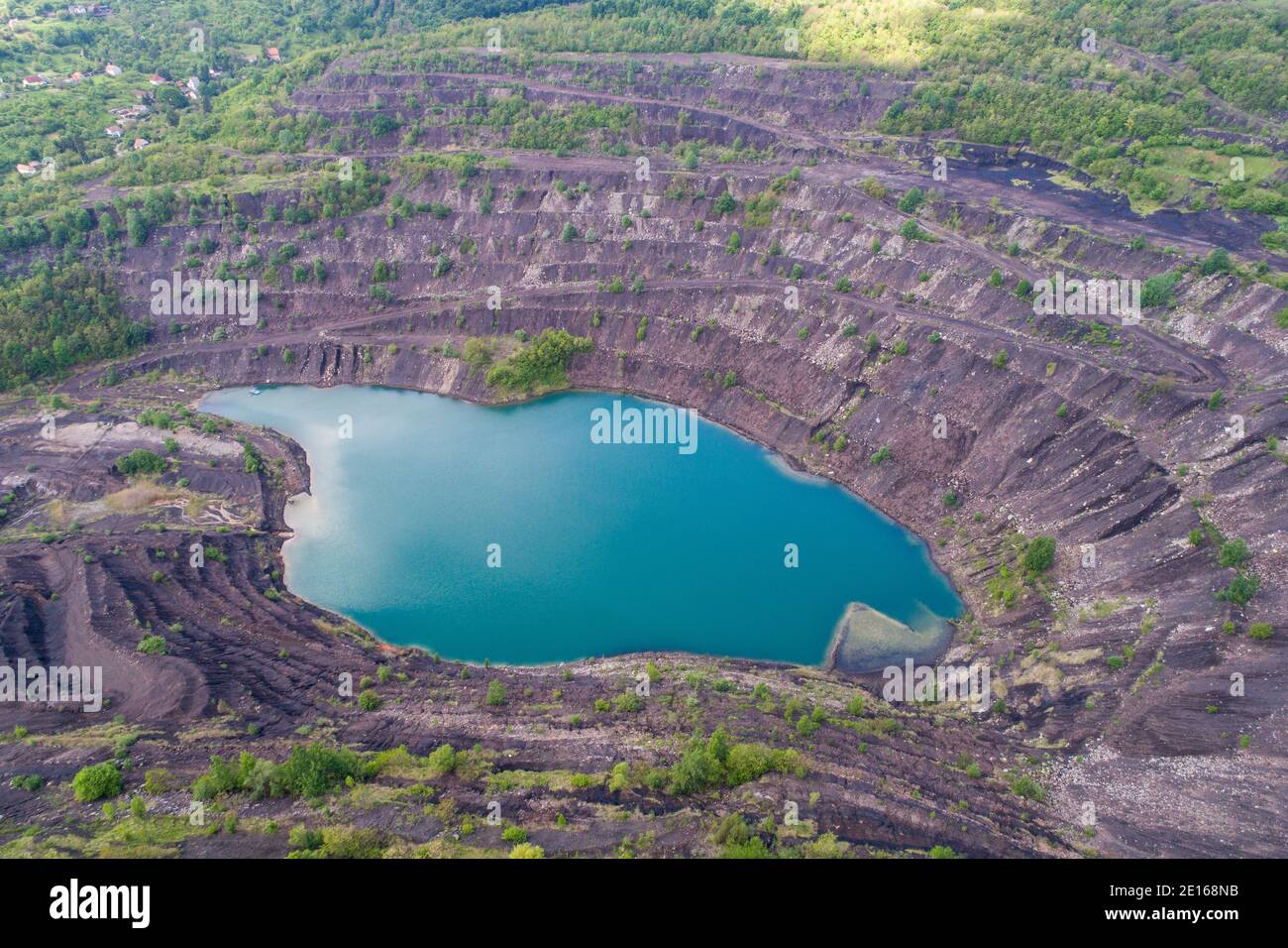 Aerial view, deep mine lake in place of a mining pit Stock Photo - Alamy