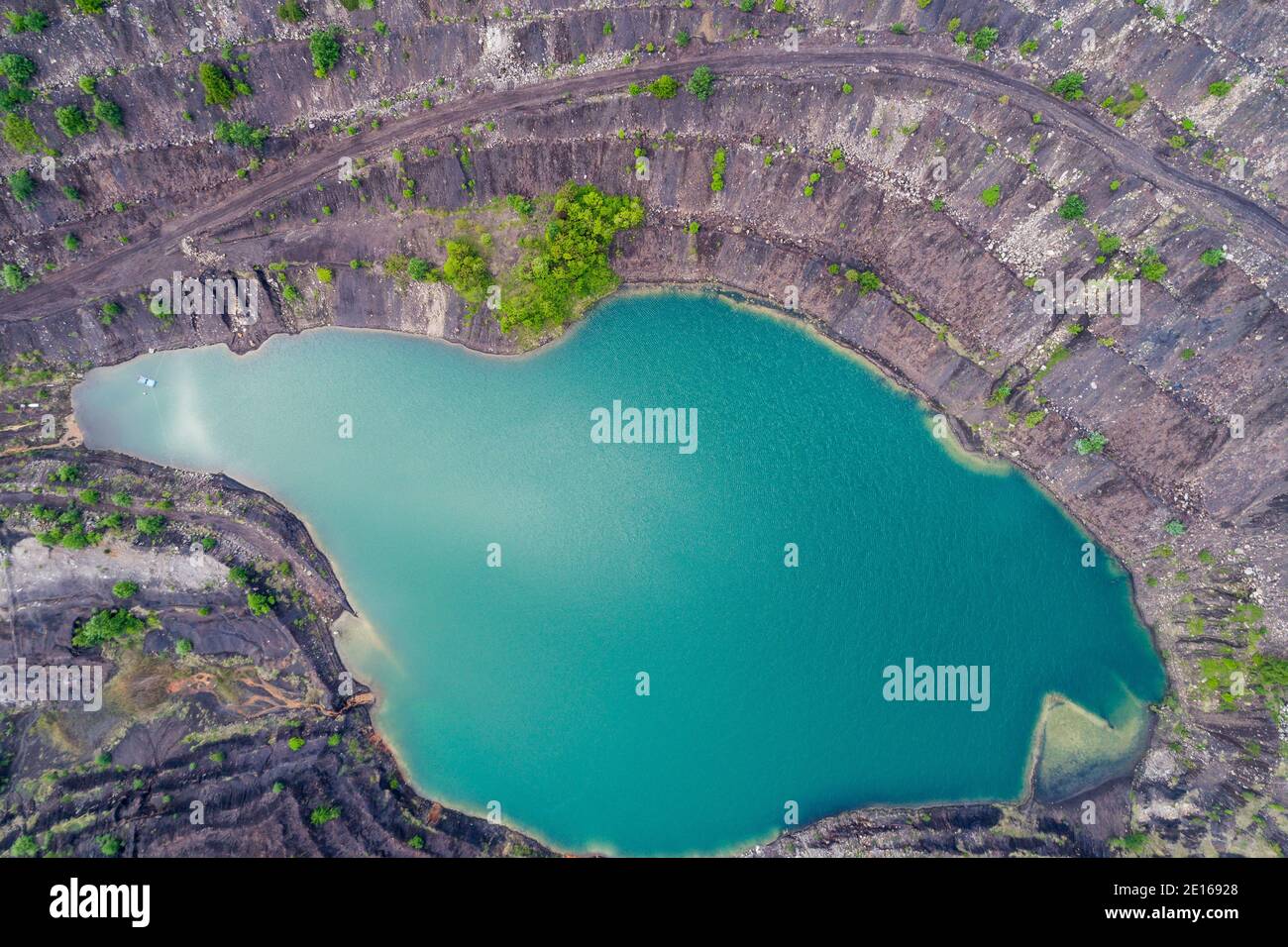 Aerial view, deep mine lake in place of a mining pit Stock Photo - Alamy