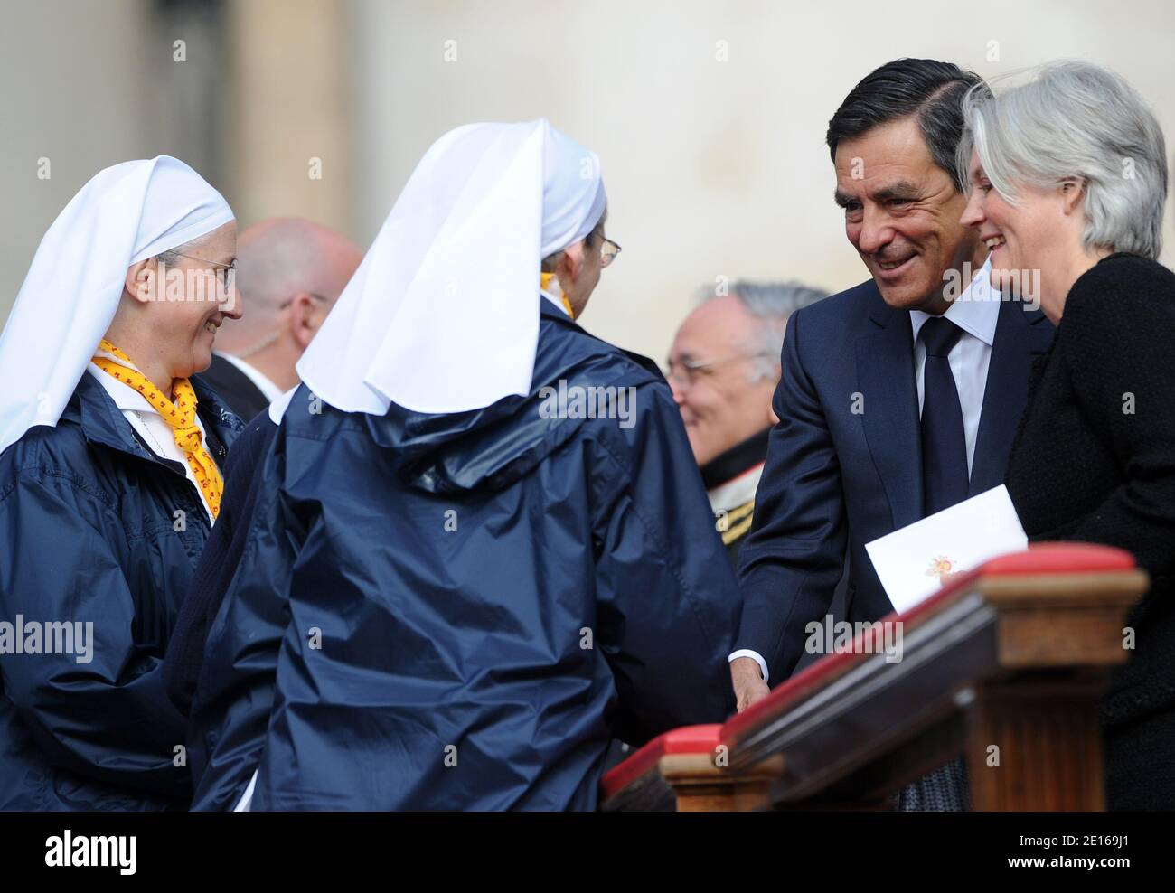 French Prime Minister Francois Fillon and his wife Penelope attend the ...
